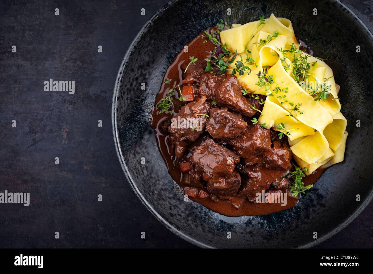 Traditional German braised venison ragout with vegetable and ...