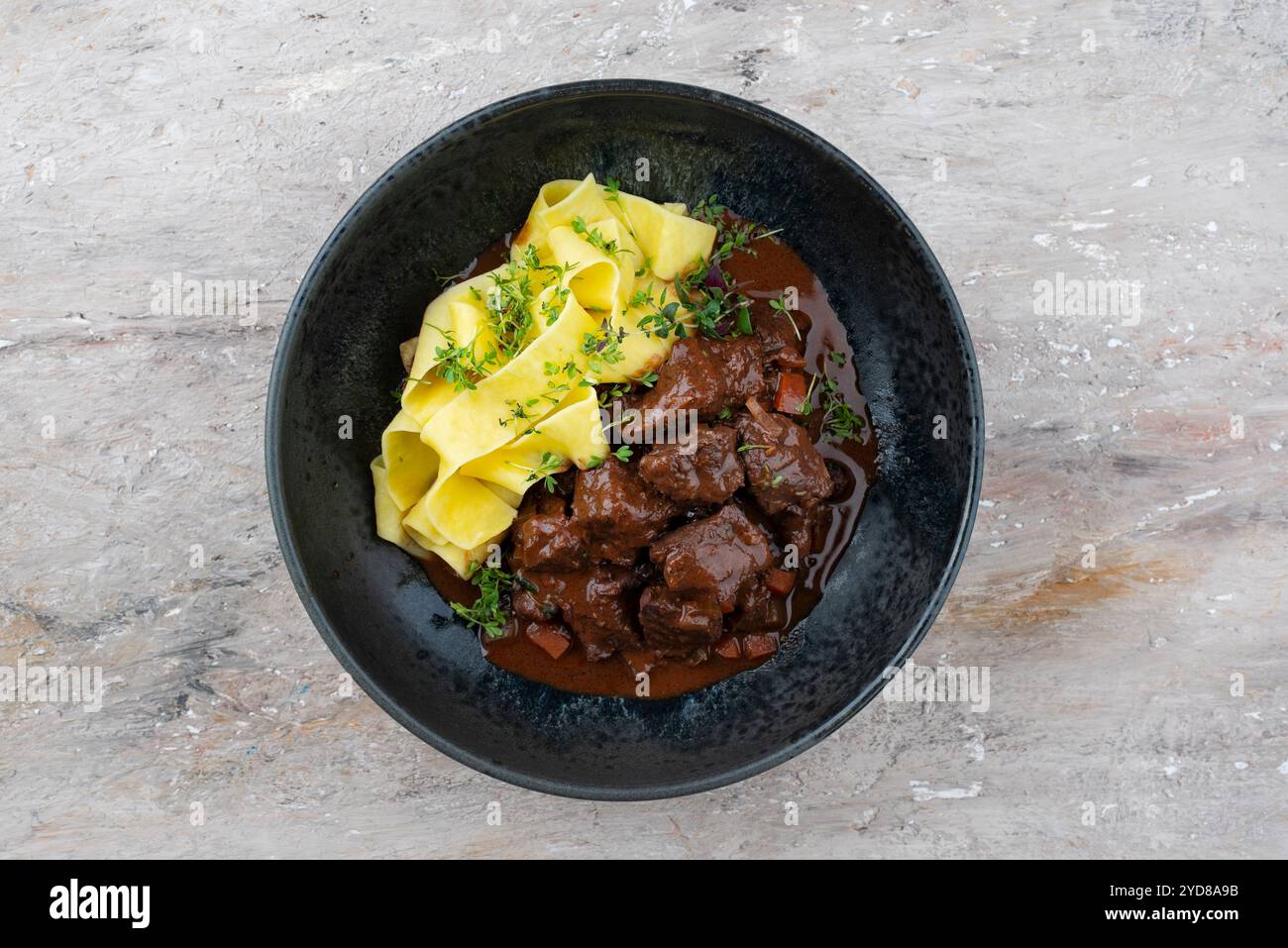 Traditional German braised venison ragout with vegetable and ...