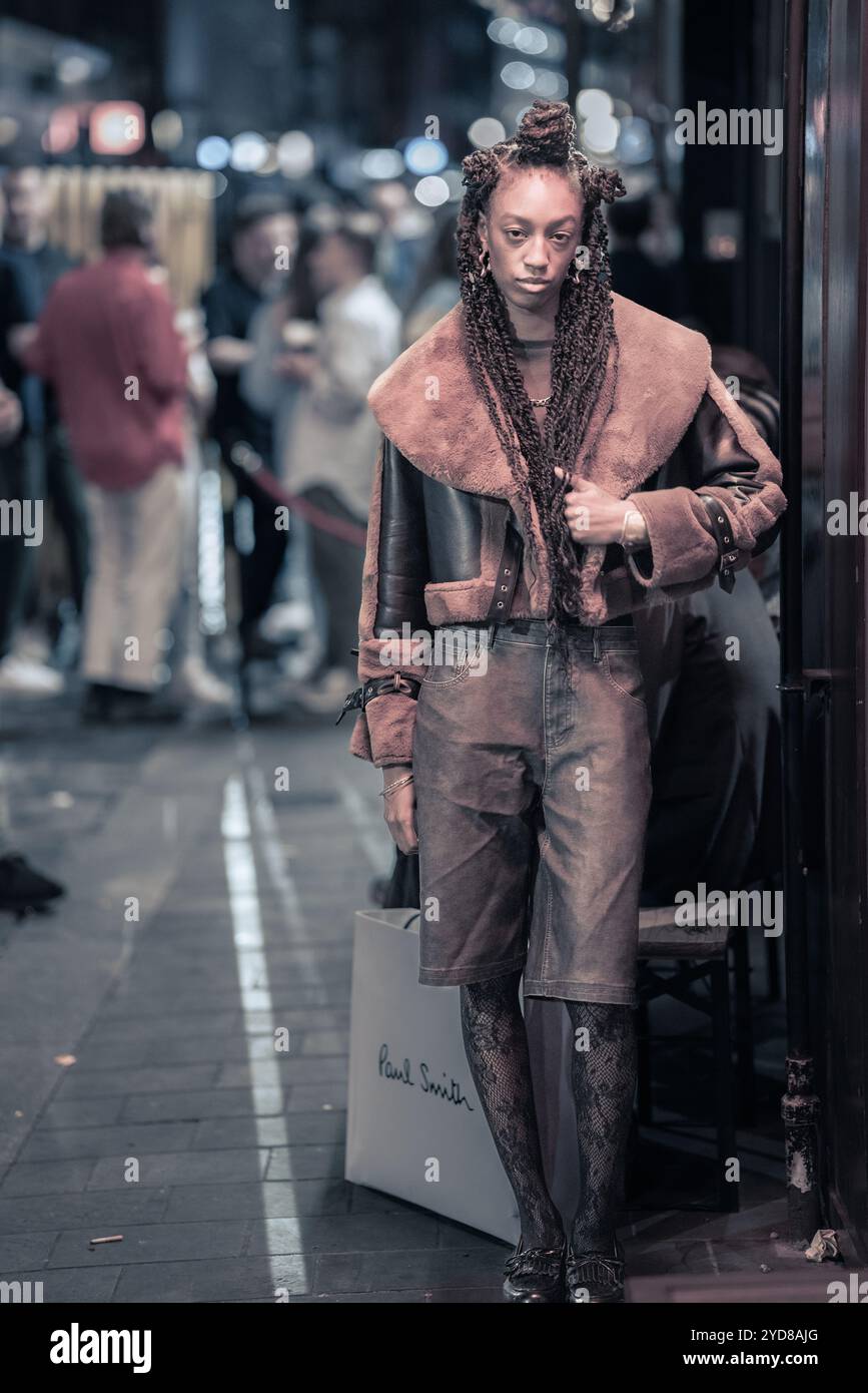 Black female model in Soho at night Stock Photo - Alamy