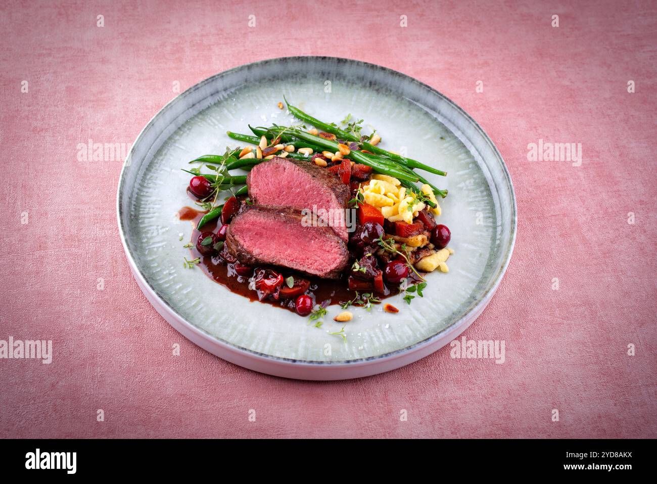 Traditionally roasted saddle of venison fillet with spÃ¤tzle Stock ...