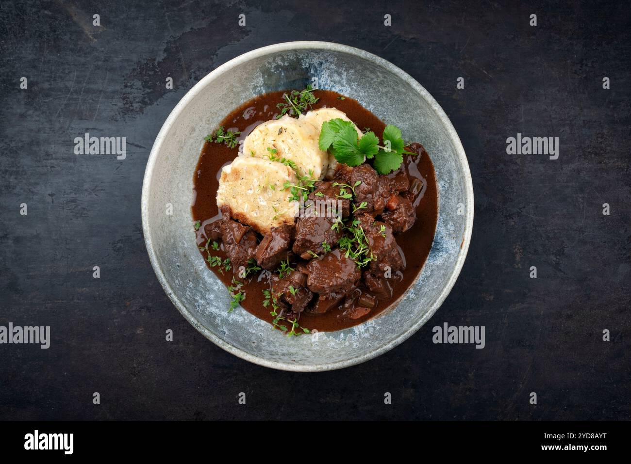 Traditional German braised venison ragout with vegetable and ...