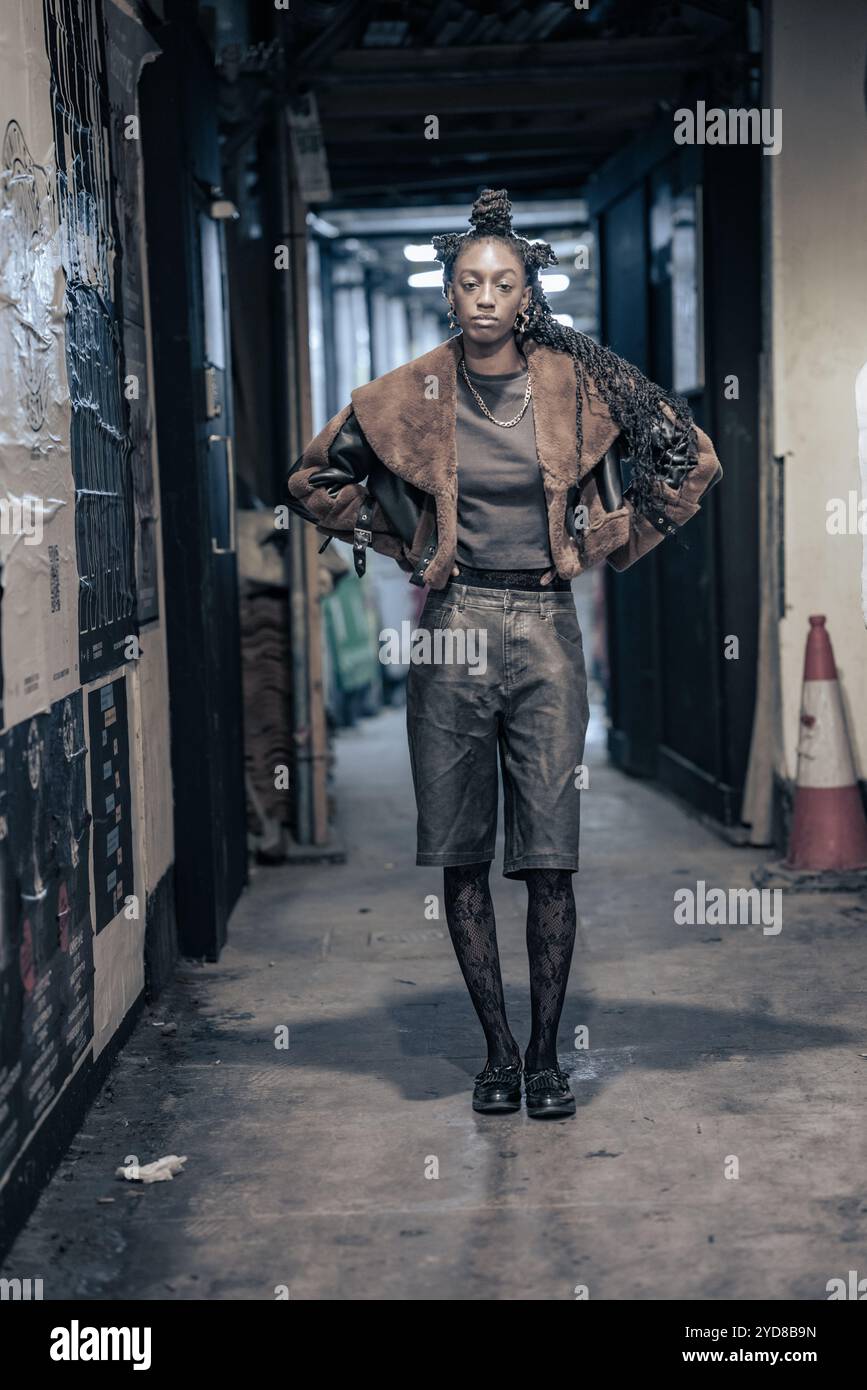Black female model in Soho at night Stock Photo - Alamy