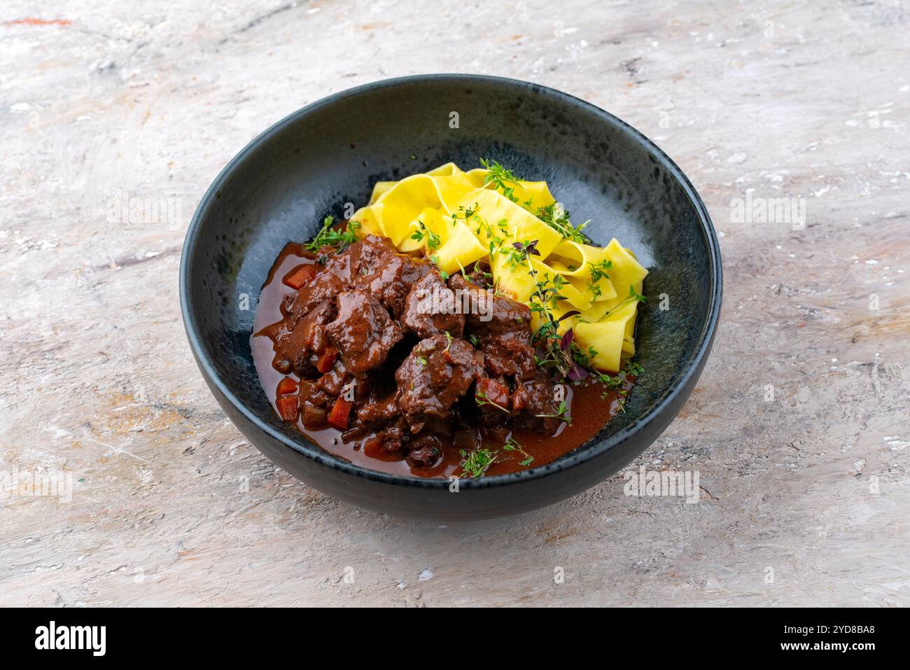 Traditional German braised venison ragout with vegetable and ...