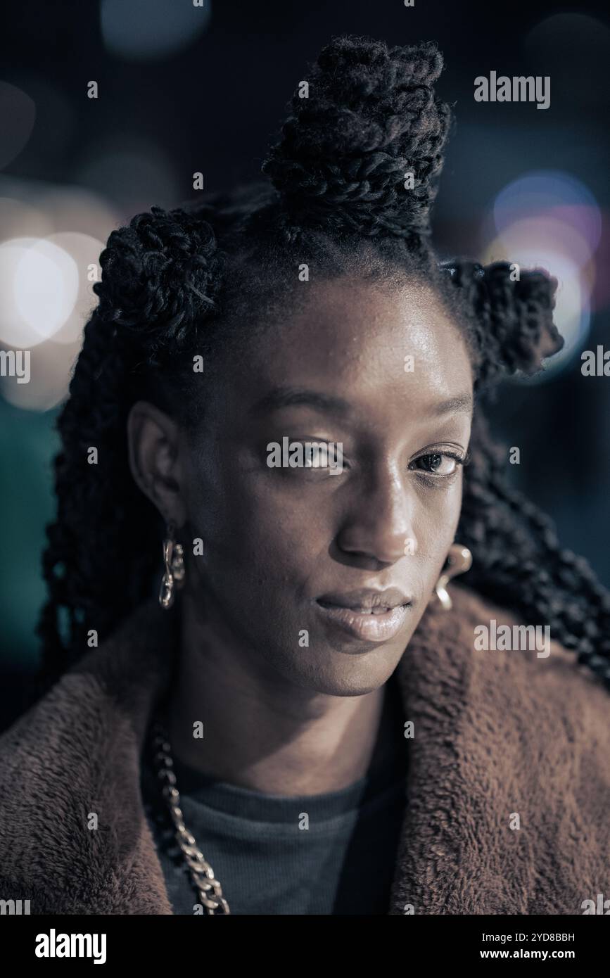 Black female model in Soho at night Stock Photo - Alamy