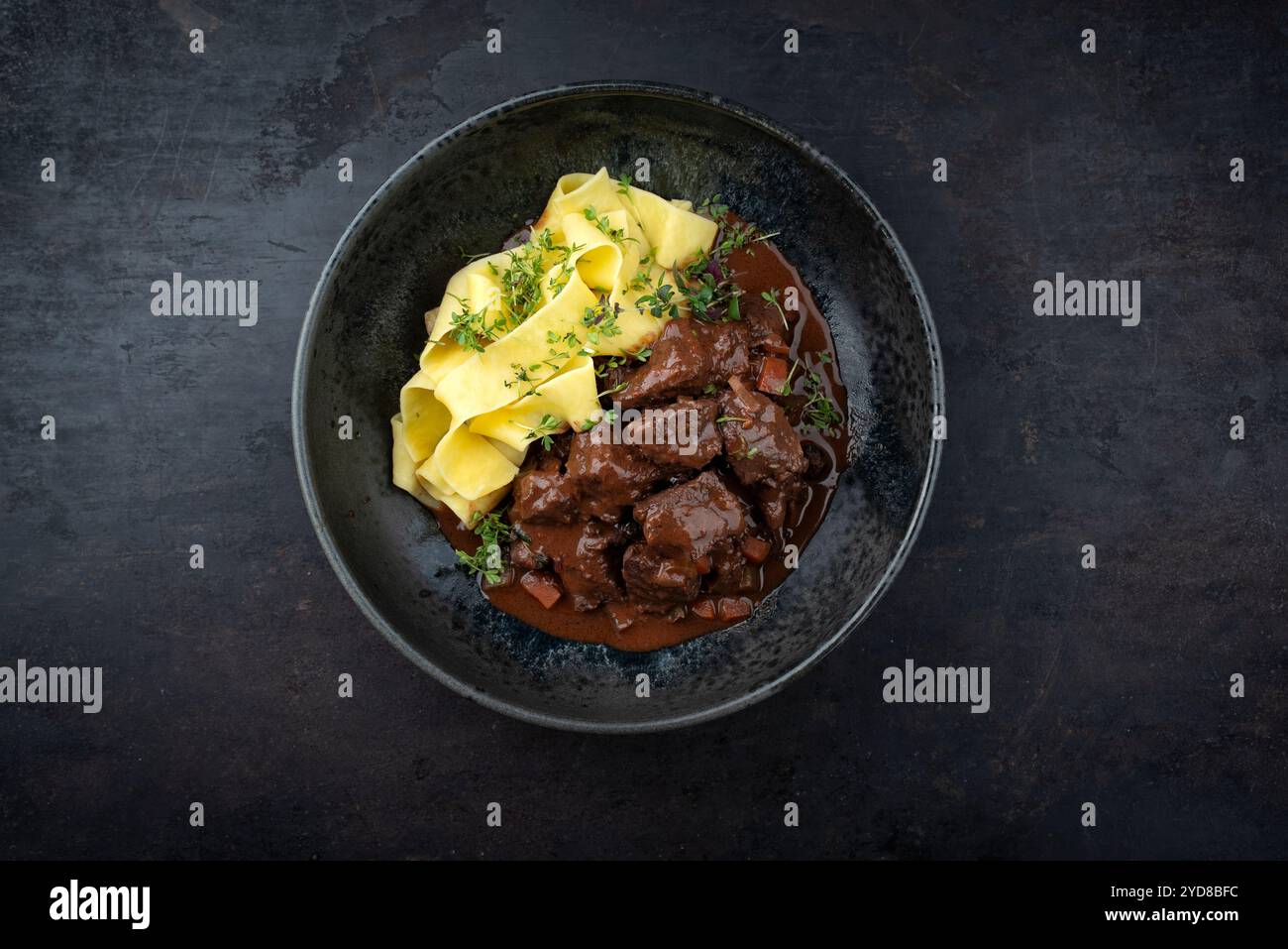 Traditional German braised venison ragout with vegetable and ...