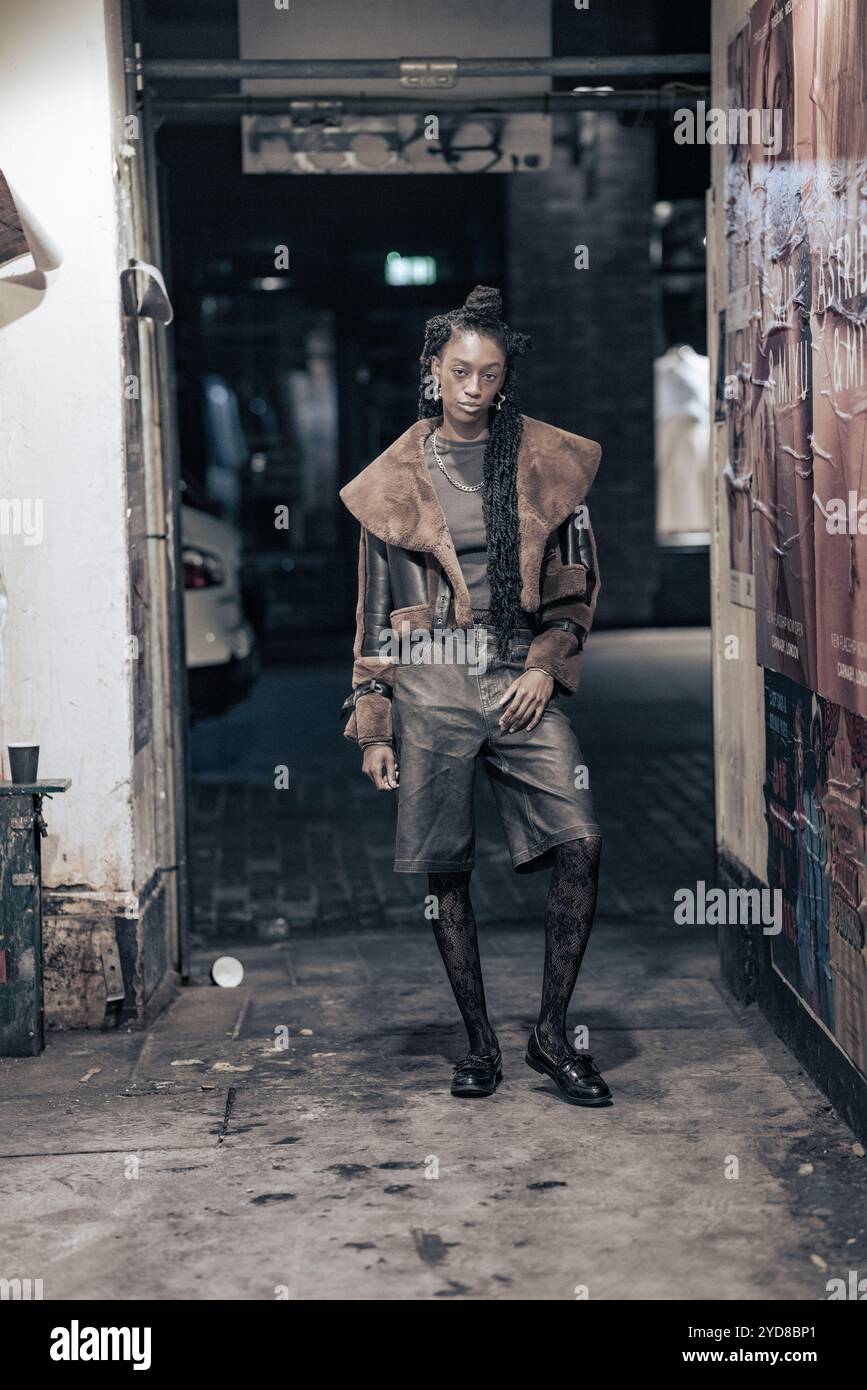 Black female model in Soho at night Stock Photo - Alamy