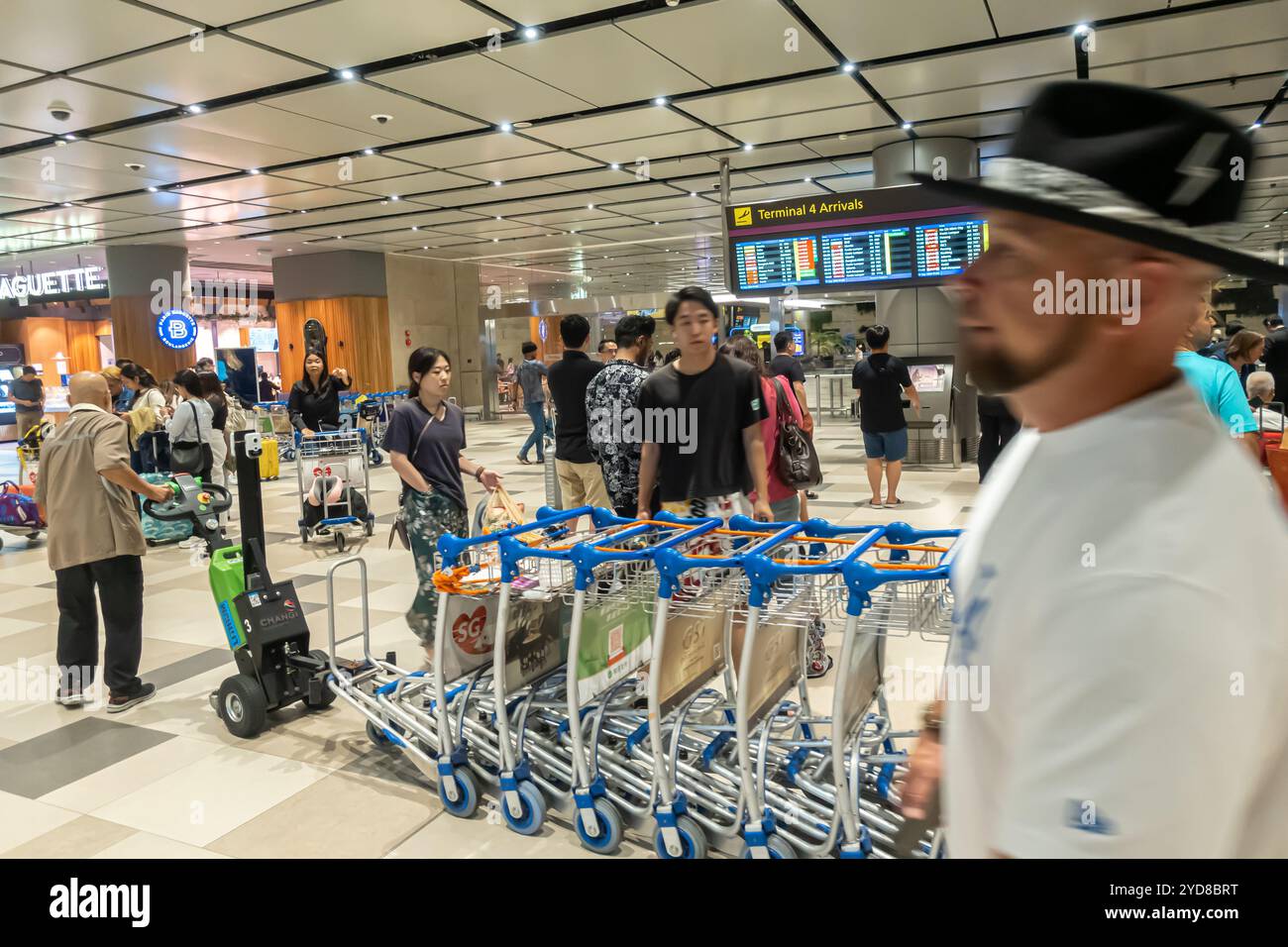 Singapore Changi Airport Terminal 4, travelers, travellers, Caucasian ...