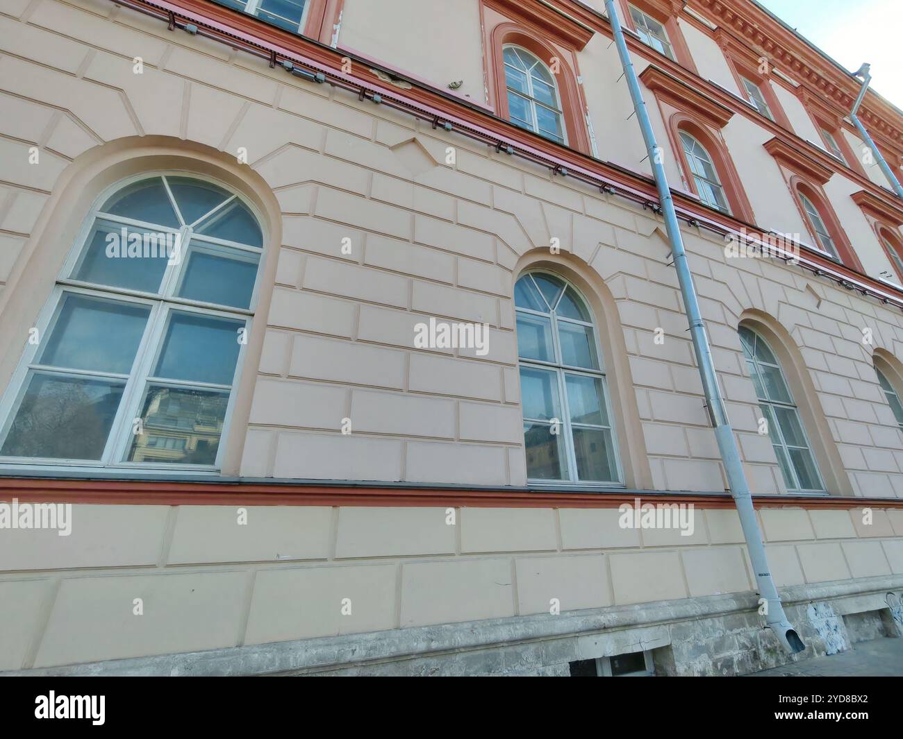 two-story classical building with intricate architectural details ...