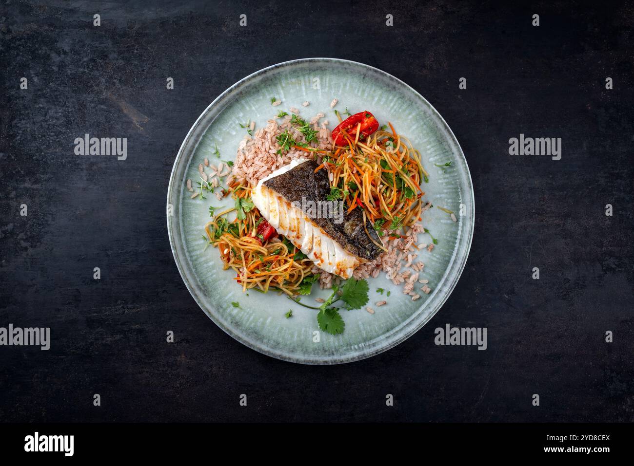 Fried skrei cod fish filet with papaya som tam salad and red rice ...