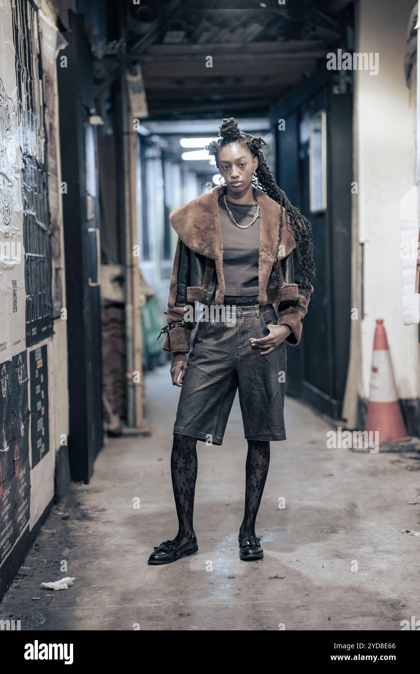 Black female model in Soho at night Stock Photo - Alamy