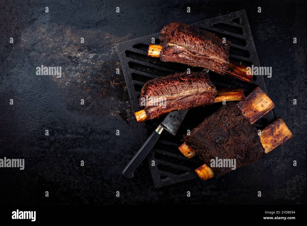 Traditional barbecue burnt chuck beef ribs marinated with spicy rub and ...