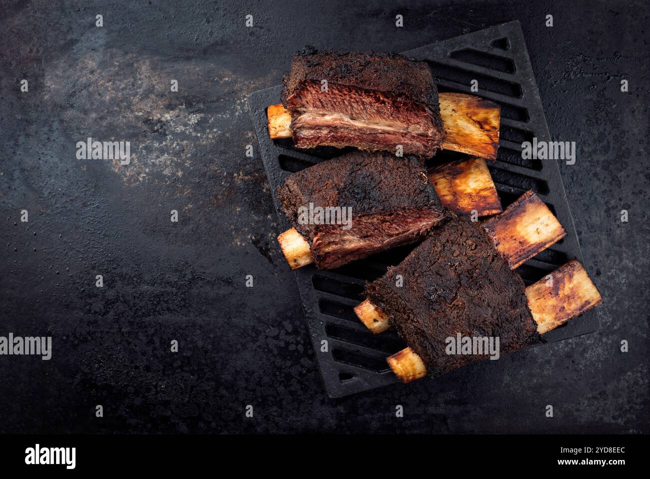 Traditional barbecue burnt chuck beef ribs marinated with spicy rub and ...