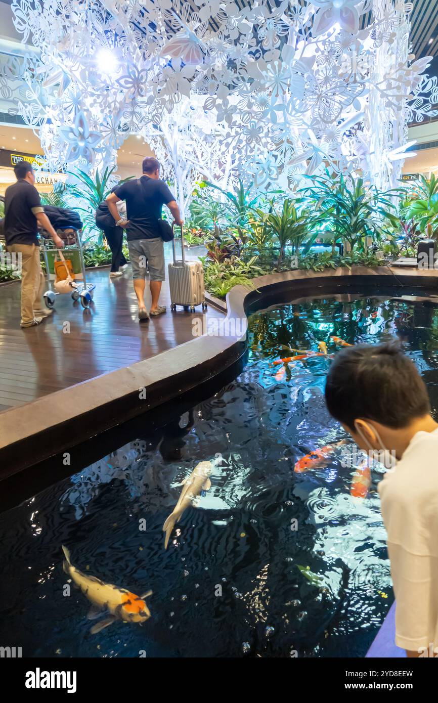 Steel in Bloom installation, koi fish aquarium pond, in Singapore ...