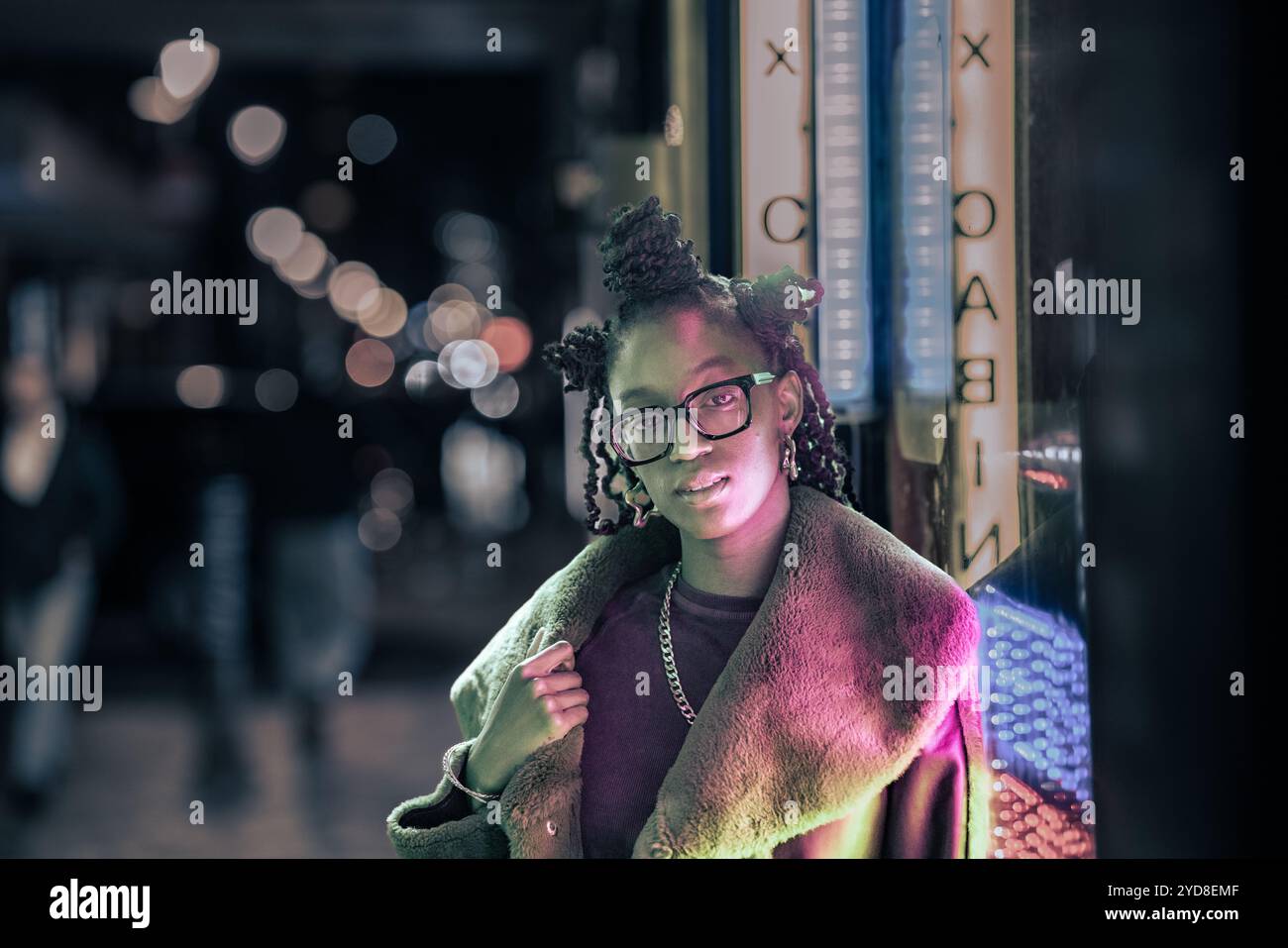Black female model in Soho at night Stock Photo - Alamy