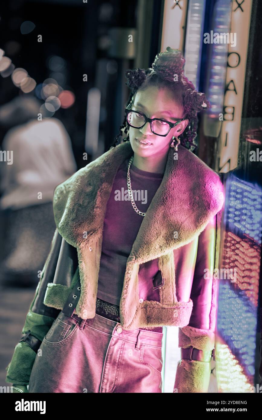 Black female model in Soho at night Stock Photo - Alamy