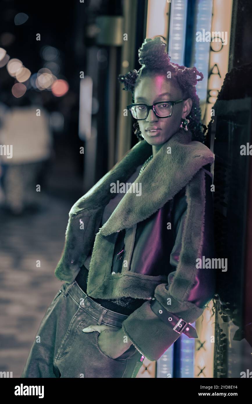 Black female model in Soho at night Stock Photo - Alamy