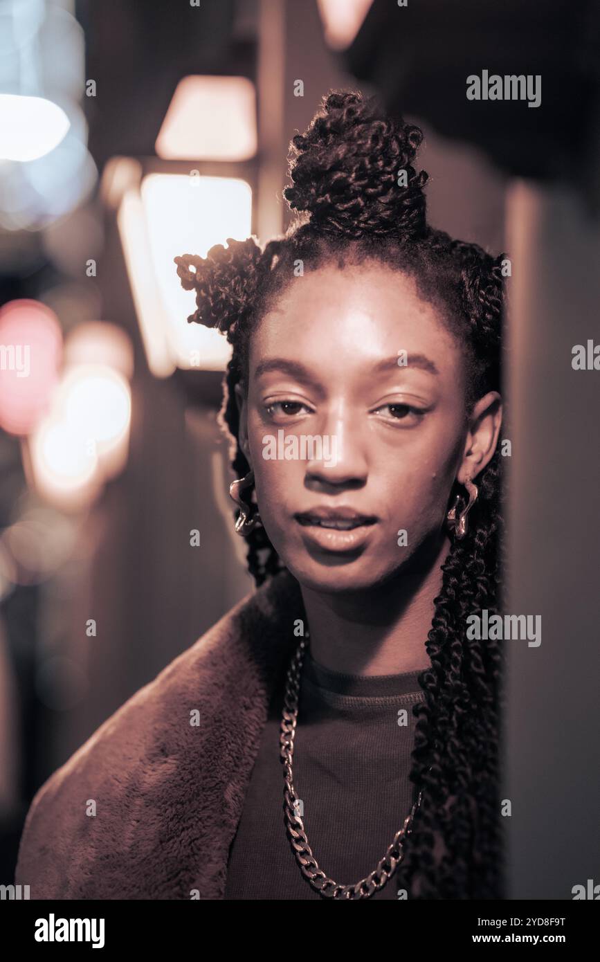 Black female model in Soho at night Stock Photo - Alamy
