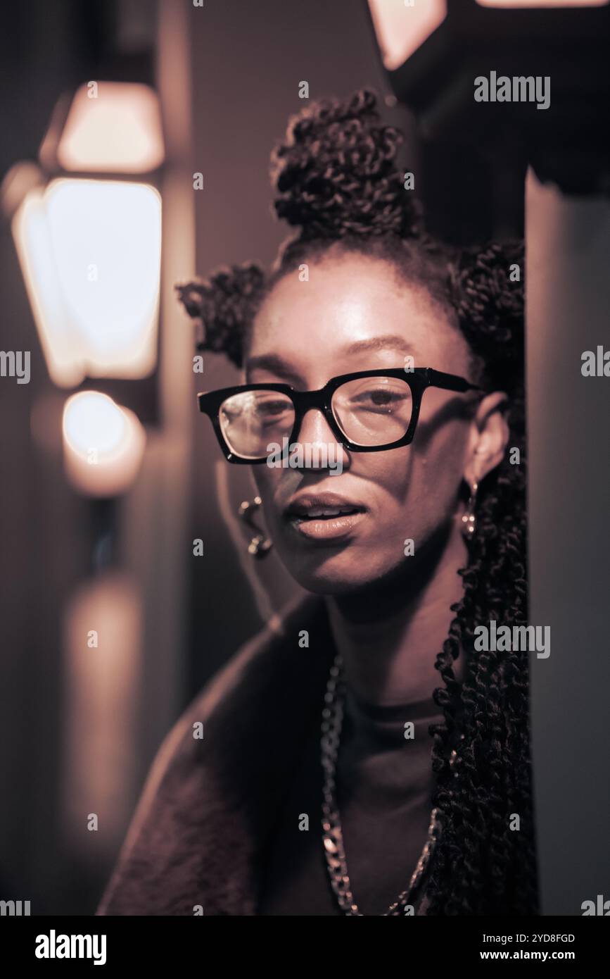 Black female model in Soho at night Stock Photo - Alamy