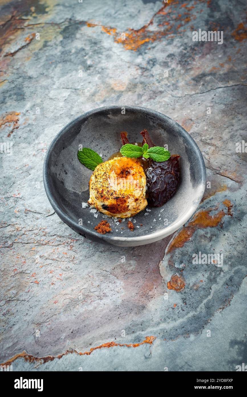 Traditional Greek goat's cheese gratinated with date fruit and salt ...