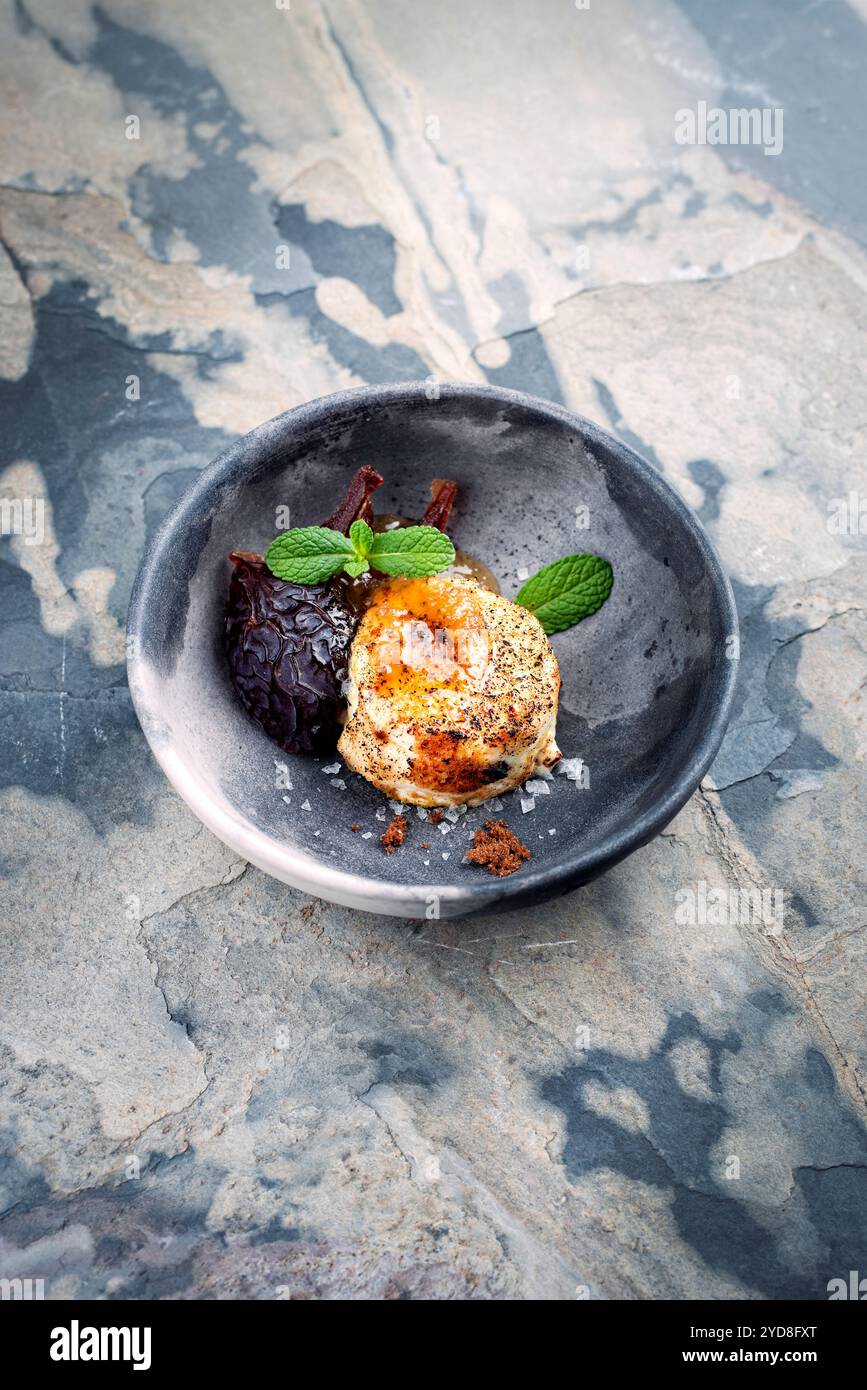 Traditional Greek goat's cheese gratinated with date fruit and salt ...