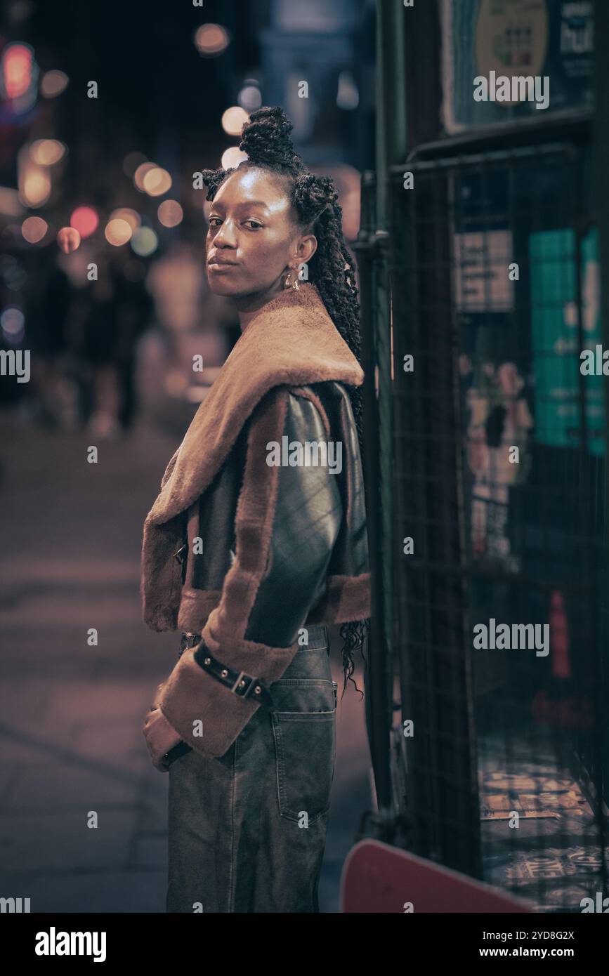 Black female model in Soho at night Stock Photo - Alamy