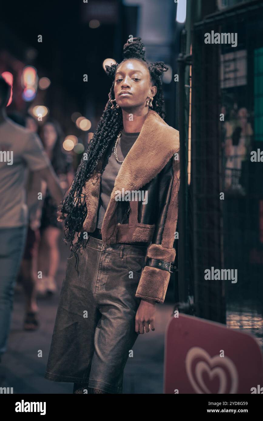 Black female model in Soho at night Stock Photo - Alamy