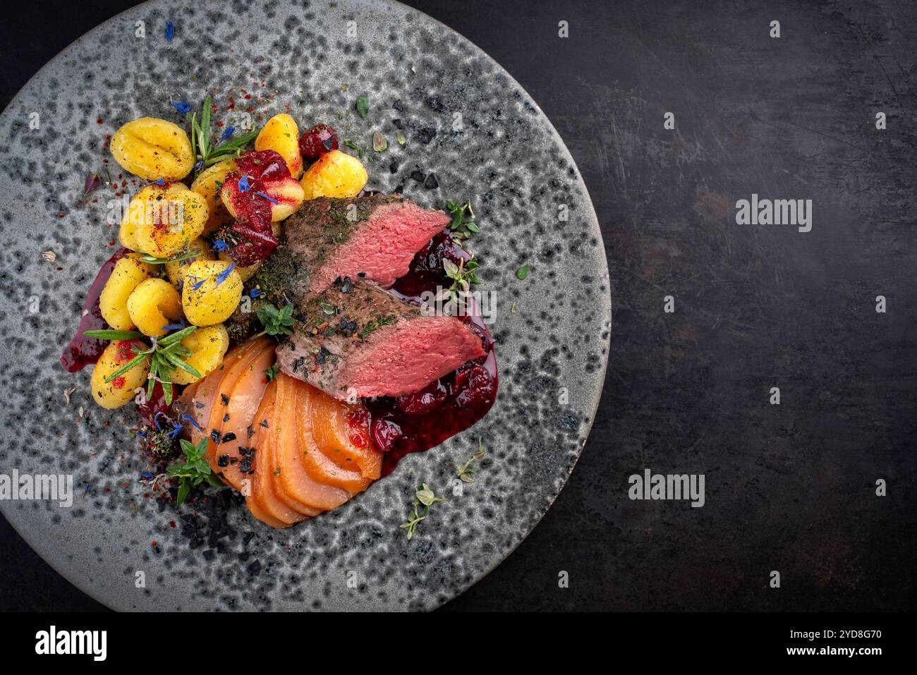 Traditional fried venison back filet with saturated pear Stock Photo ...