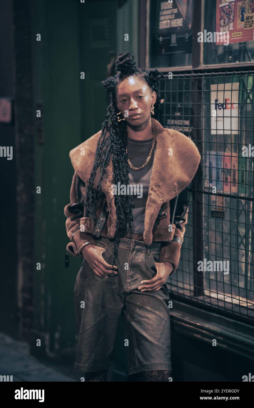 Black female model in Soho at night Stock Photo - Alamy
