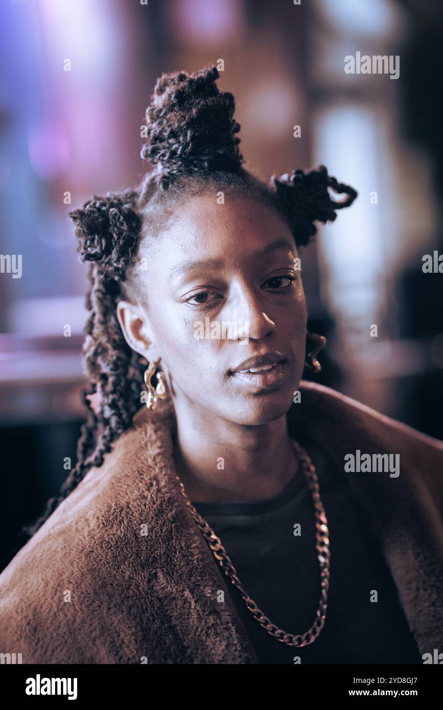 Black female model in Soho at night Stock Photo - Alamy