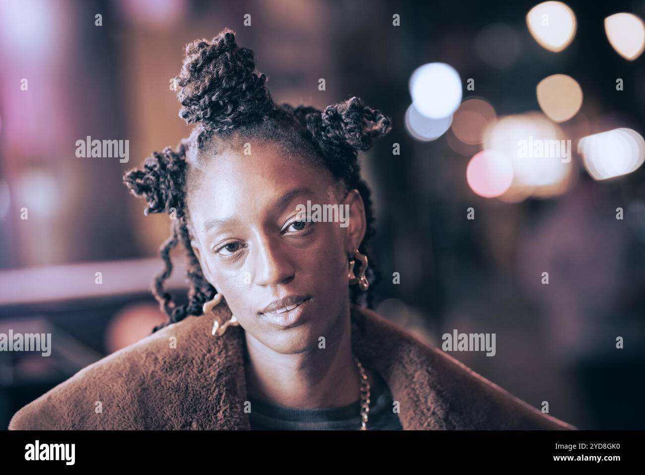 Black female model in Soho at night Stock Photo - Alamy