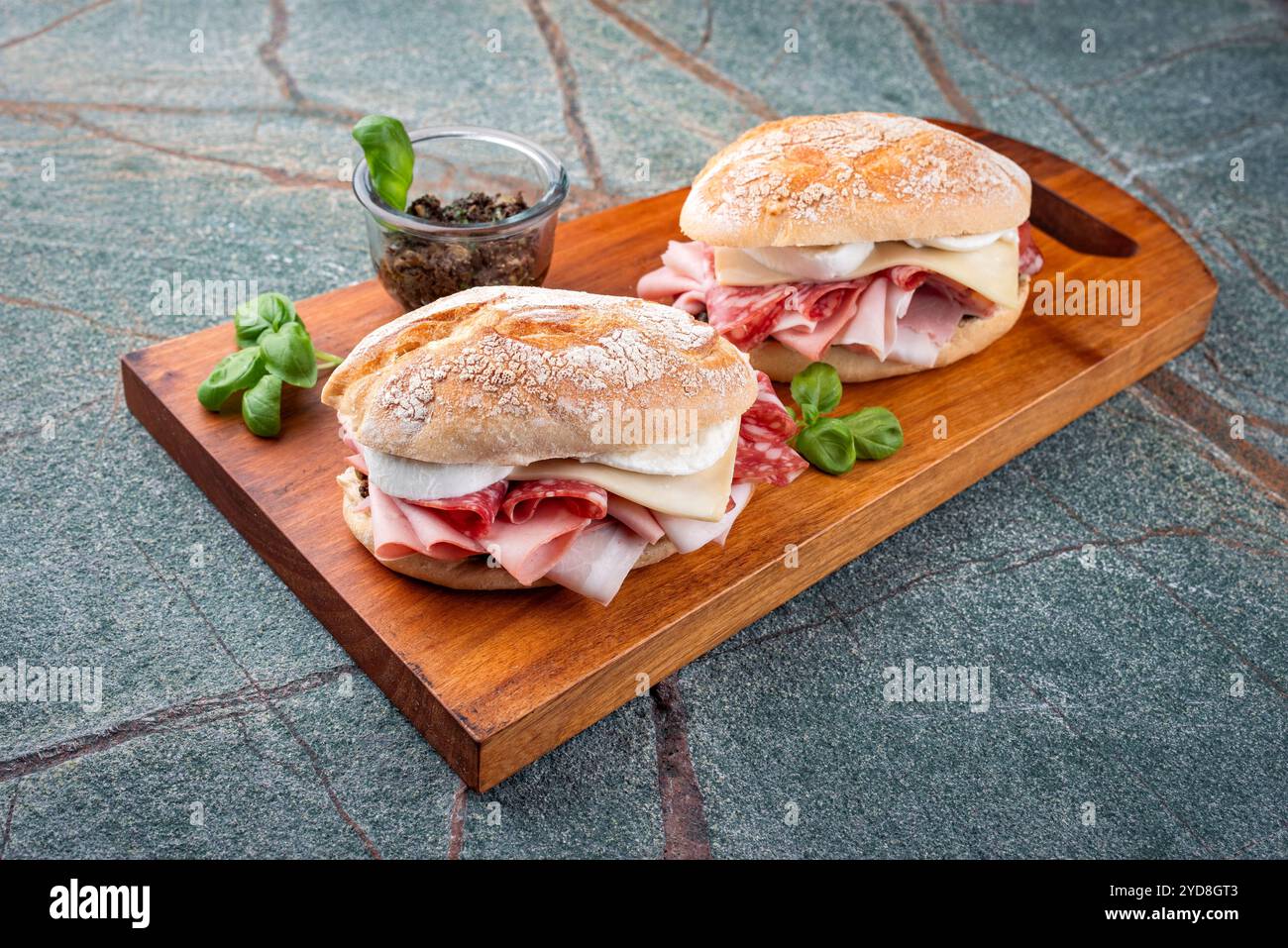 Traditional New Orleans muffaletta sandwiches with mortadella Stock ...