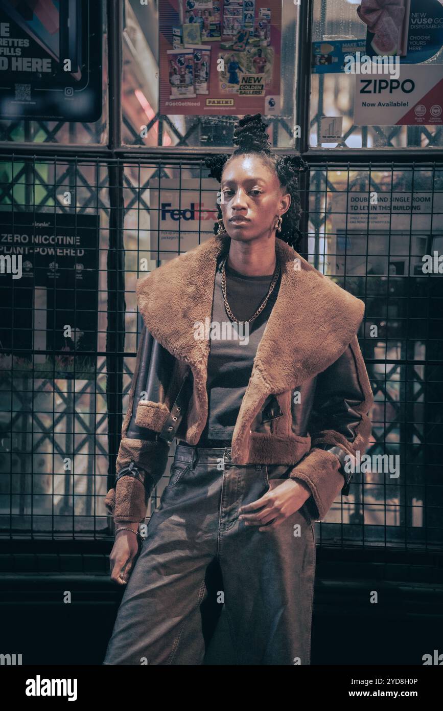 Black female model in Soho at night Stock Photo - Alamy