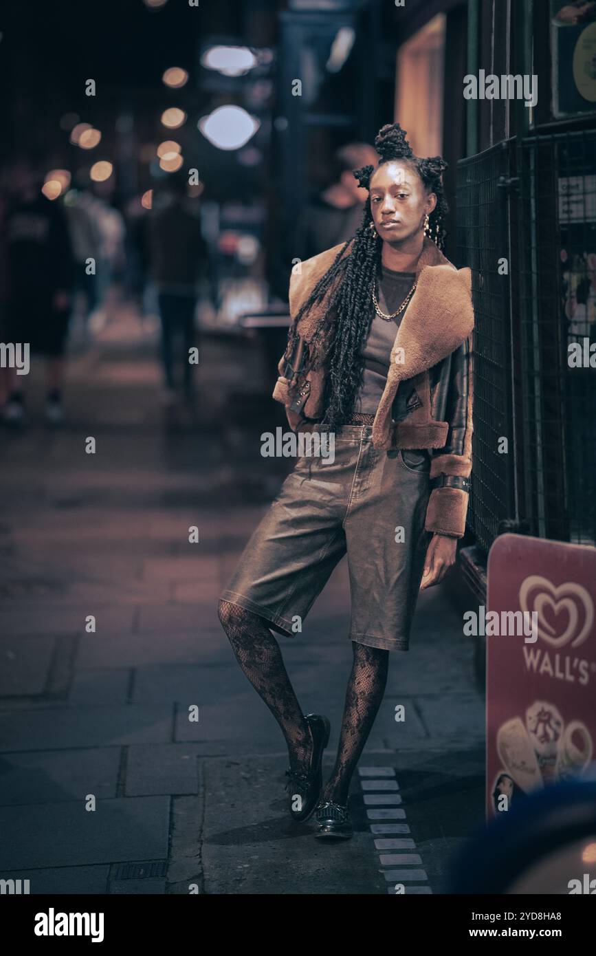 Black female model in Soho at night Stock Photo - Alamy