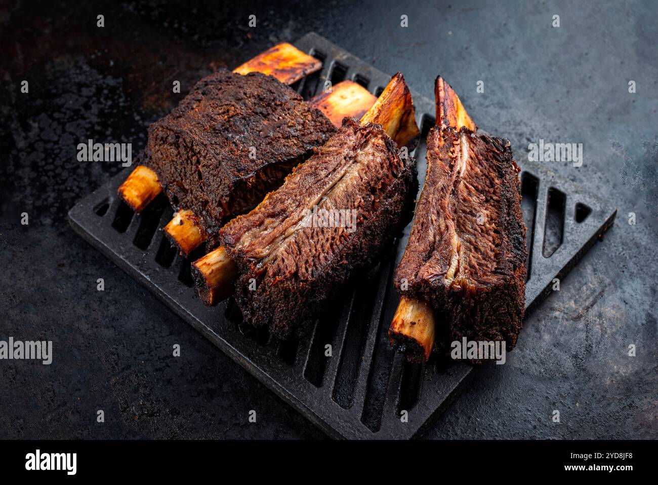 Traditional barbecue burnt chuck beef ribs marinated with spicy rub and ...