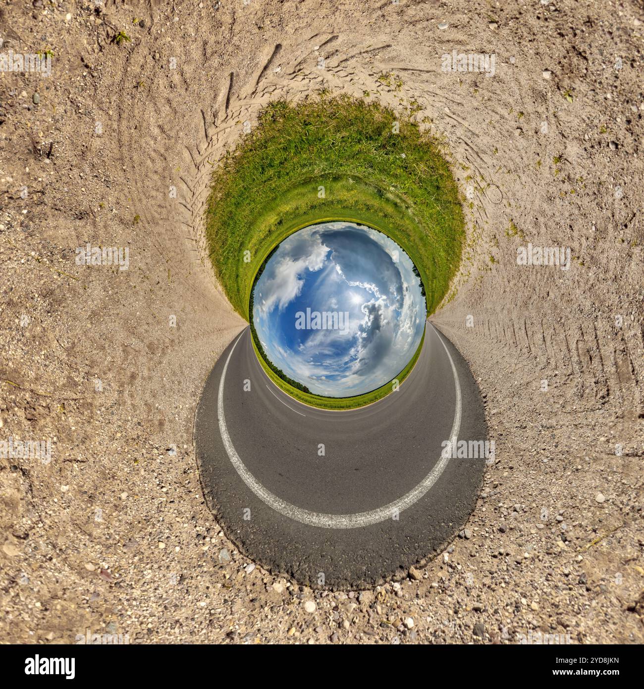 blue hole sphere or globe little planet inside green dry grass frame ...