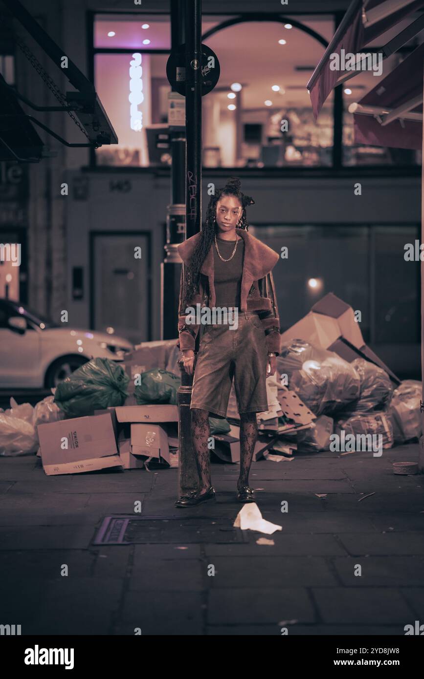 Black female model in Soho at night Stock Photo - Alamy