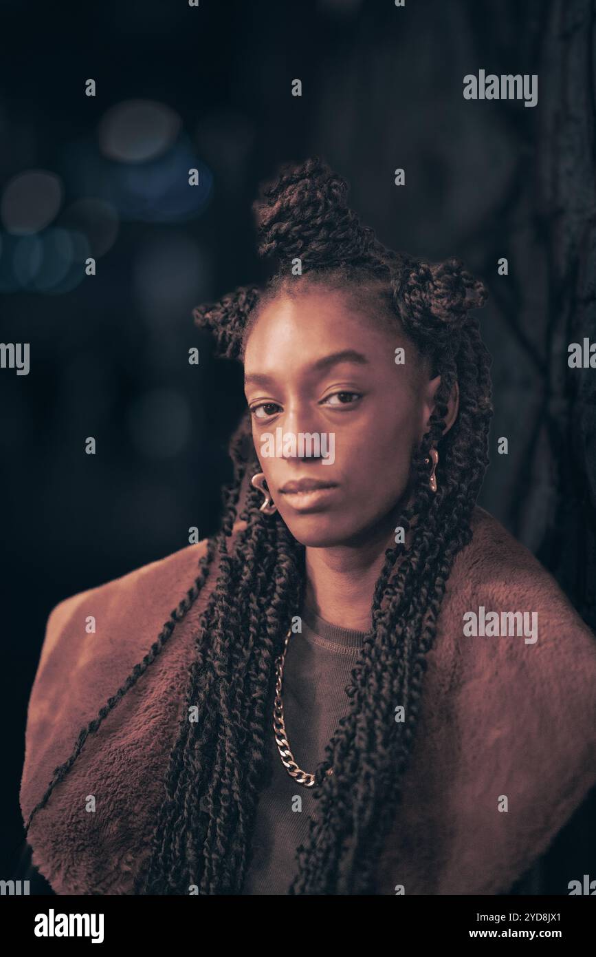 Black female model in Soho at night Stock Photo - Alamy