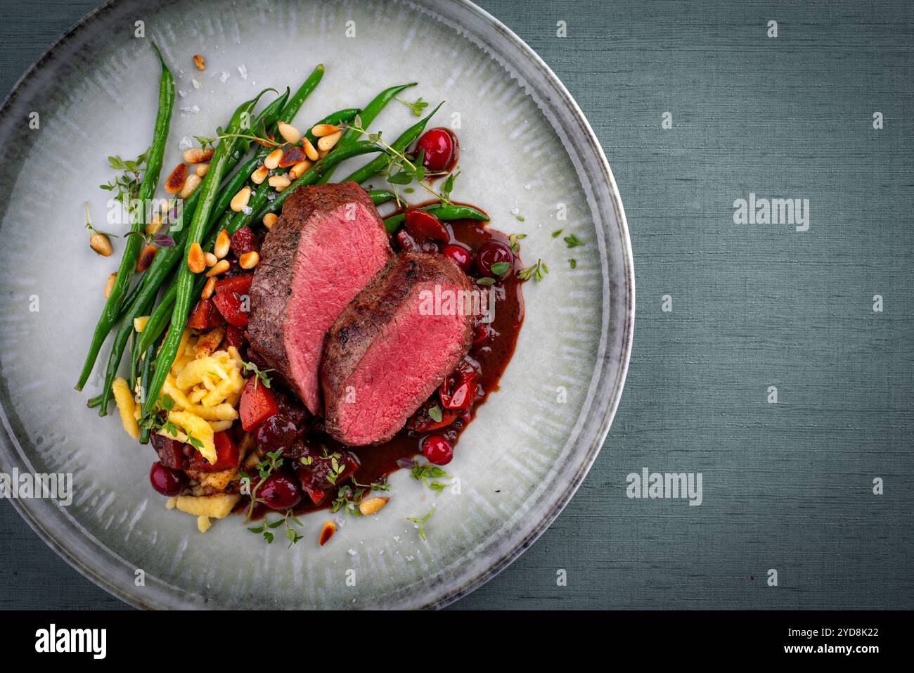 Traditionally roasted saddle of venison fillet with spÃ¤tzle Stock ...