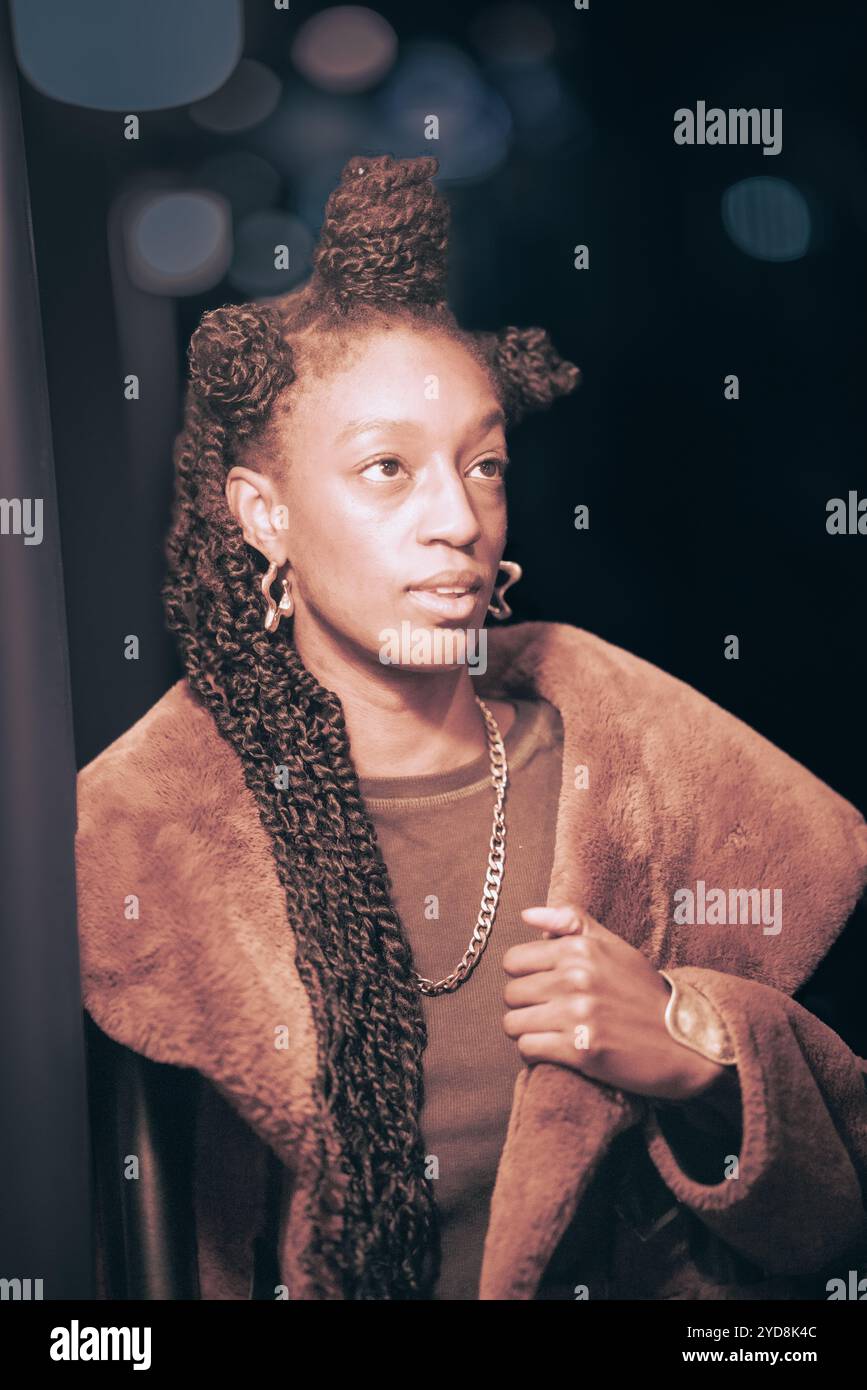 Black female model in Soho at night Stock Photo - Alamy