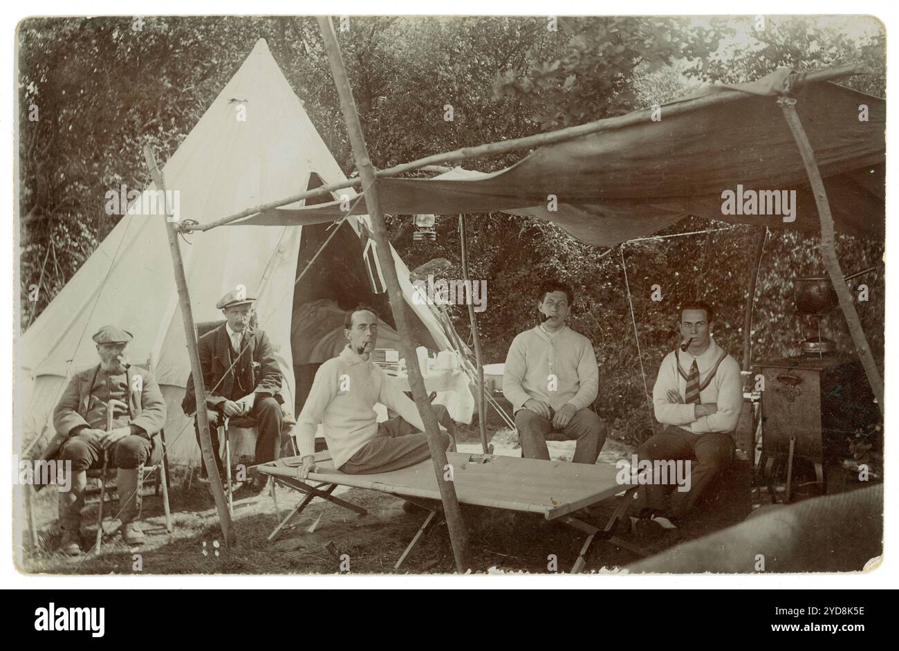 Post WW1 era postcard of young and old men camping, young brother and ...