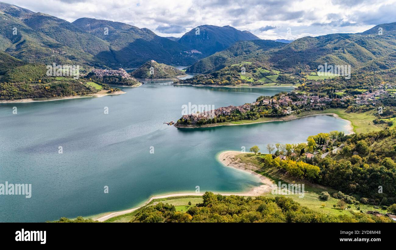 Panoramic sight of Lake Turano, with the beautiful villages of Colle di ...