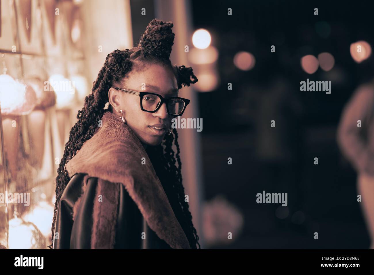 Black female model in Soho at night Stock Photo - Alamy