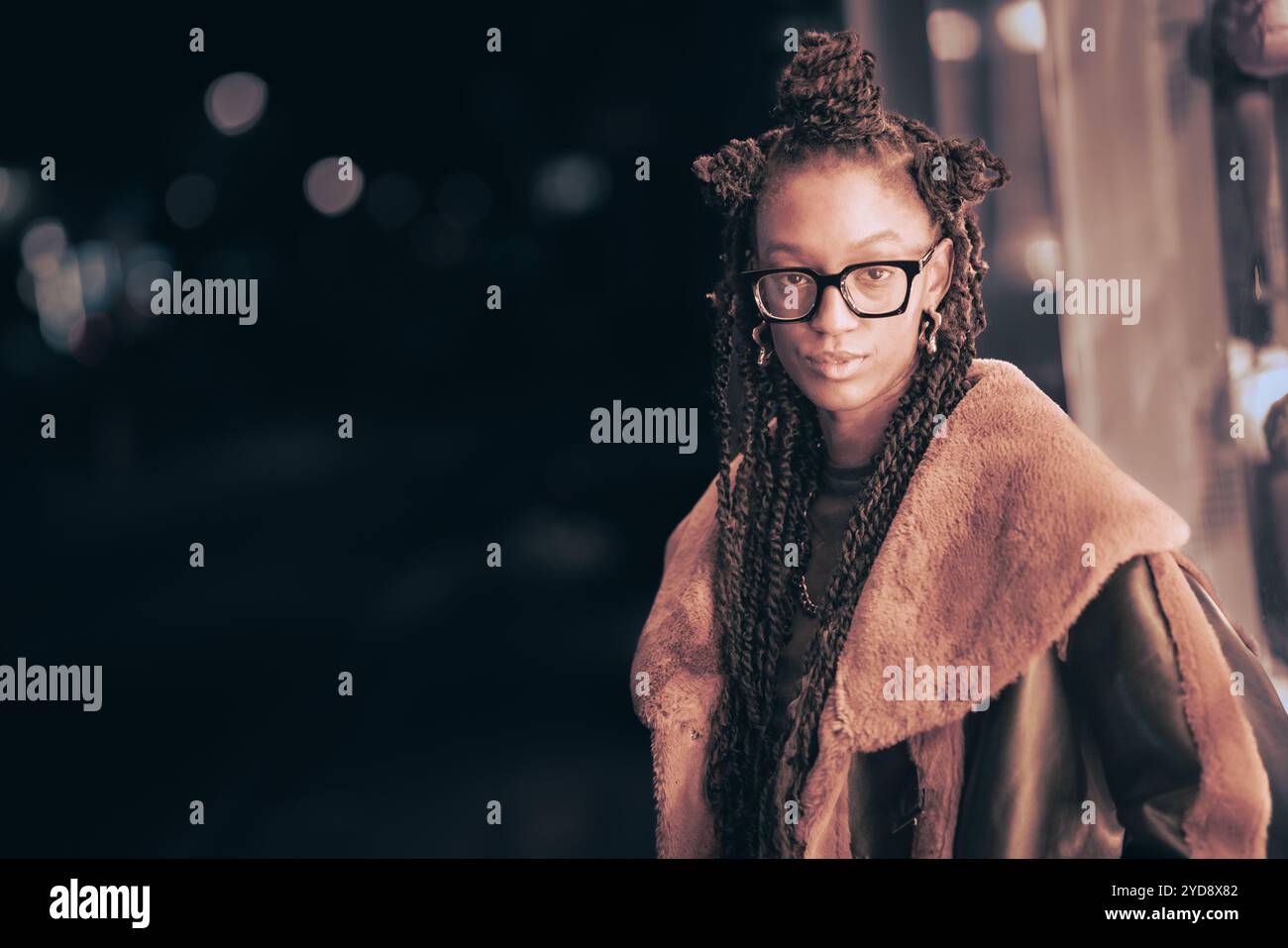 Black female model in Soho at night Stock Photo - Alamy