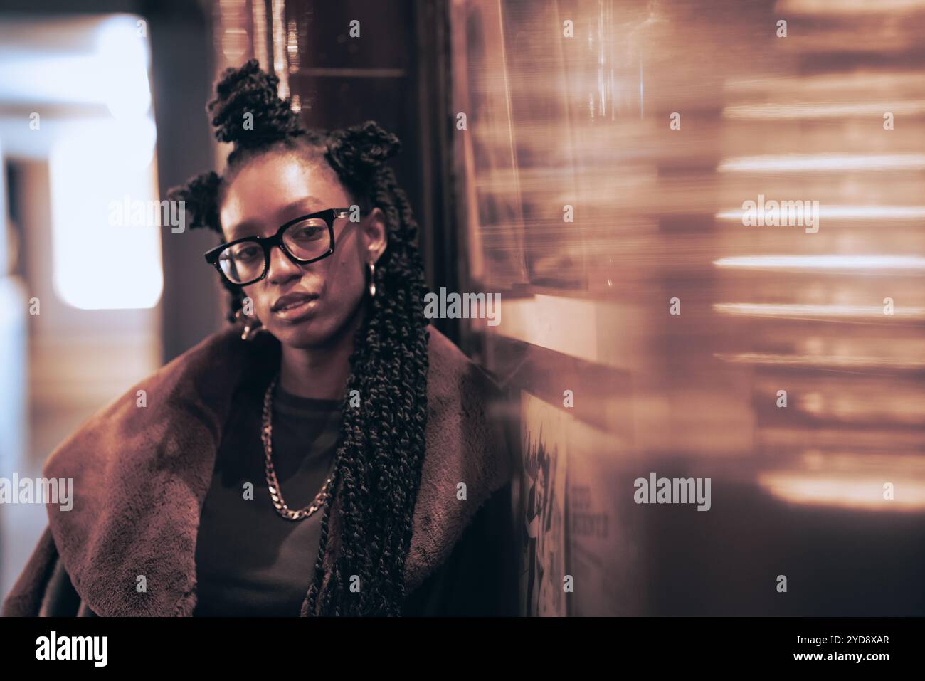 Black female model in Soho at night Stock Photo - Alamy