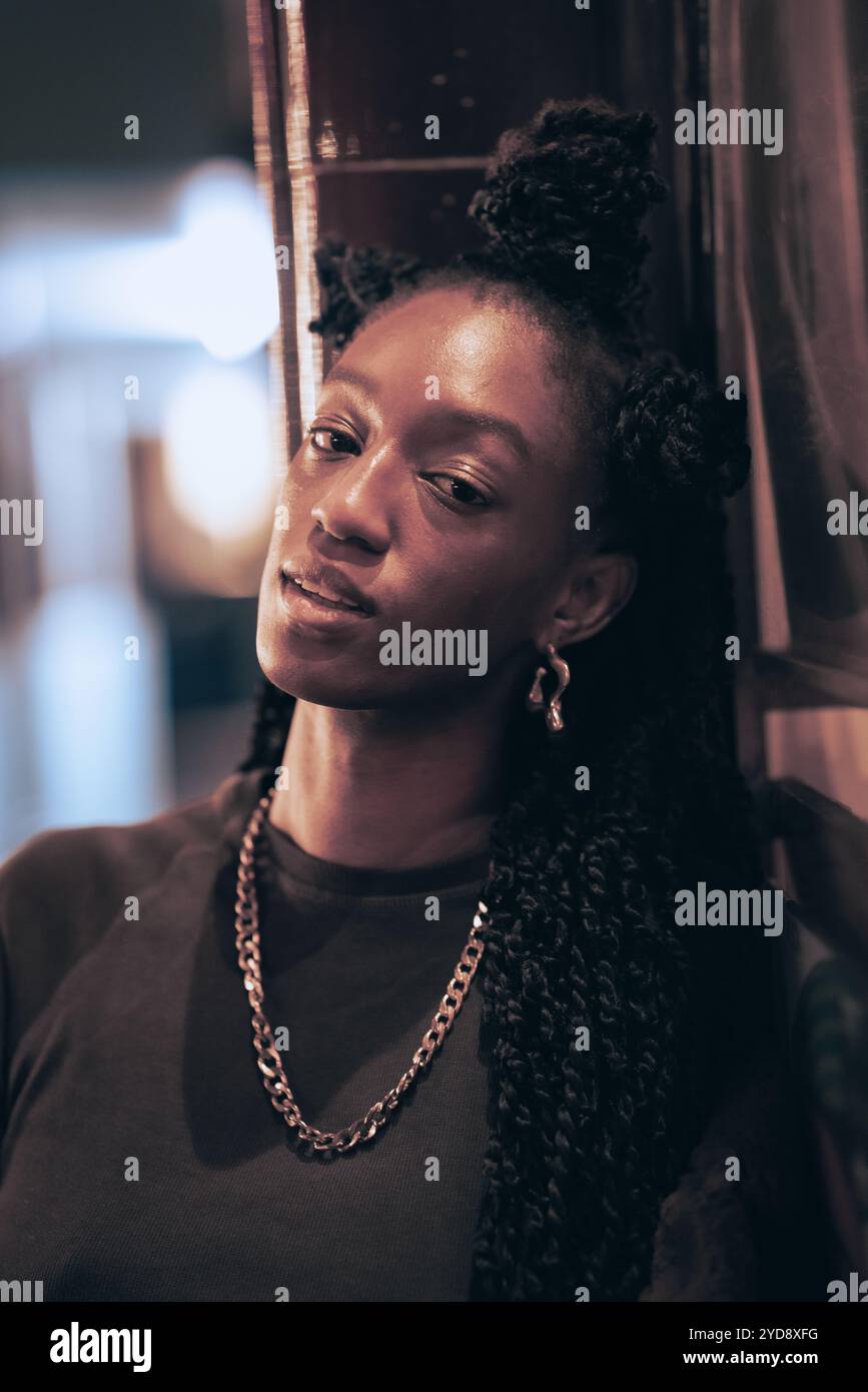 Black female model in Soho at night Stock Photo - Alamy