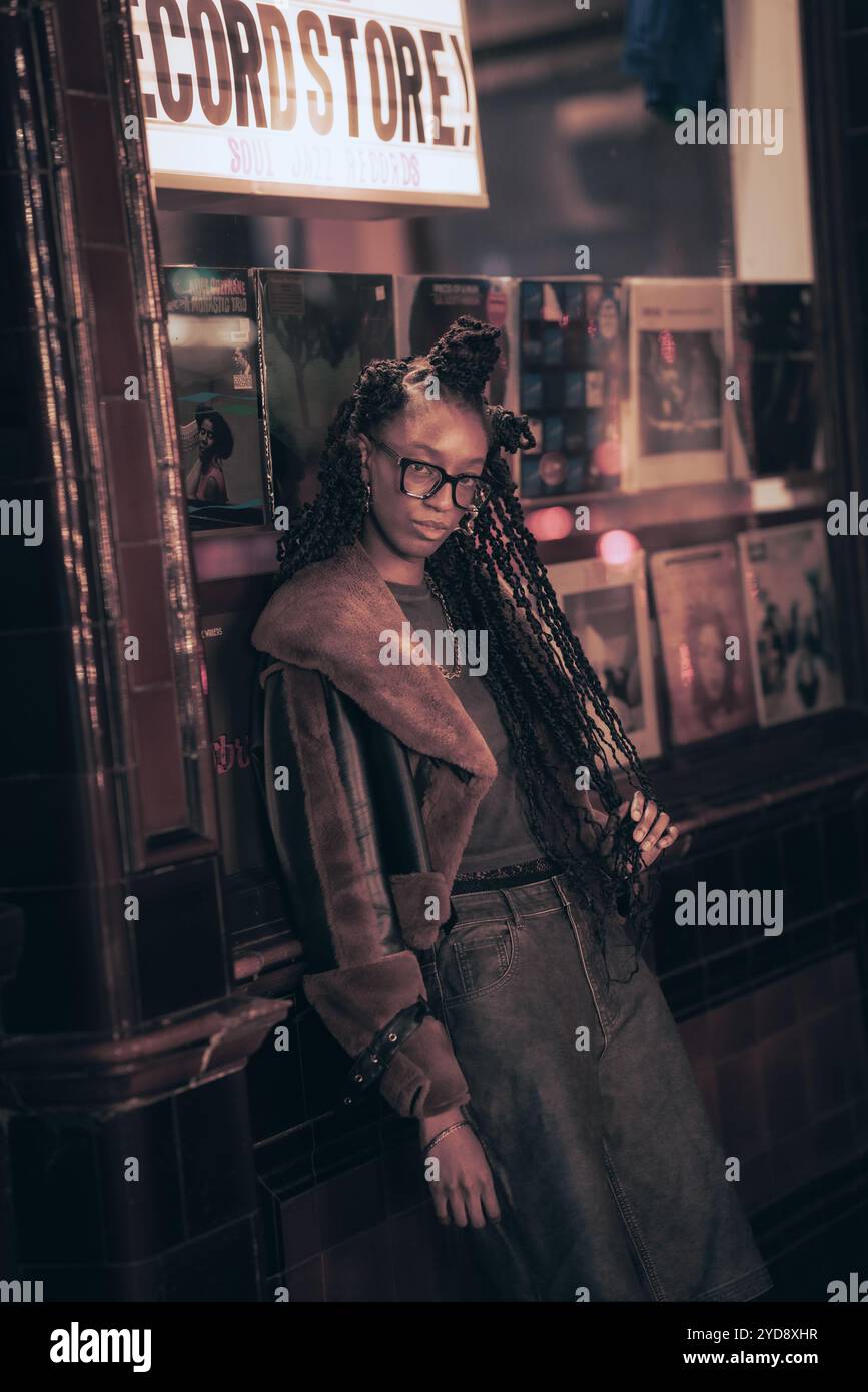 Black female model in Soho at night Stock Photo - Alamy