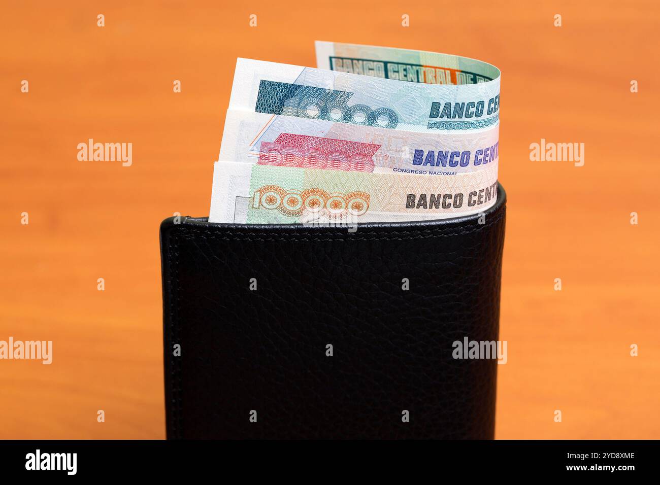 Old Peruvian sol in the black wallet Stock Photo - Alamy