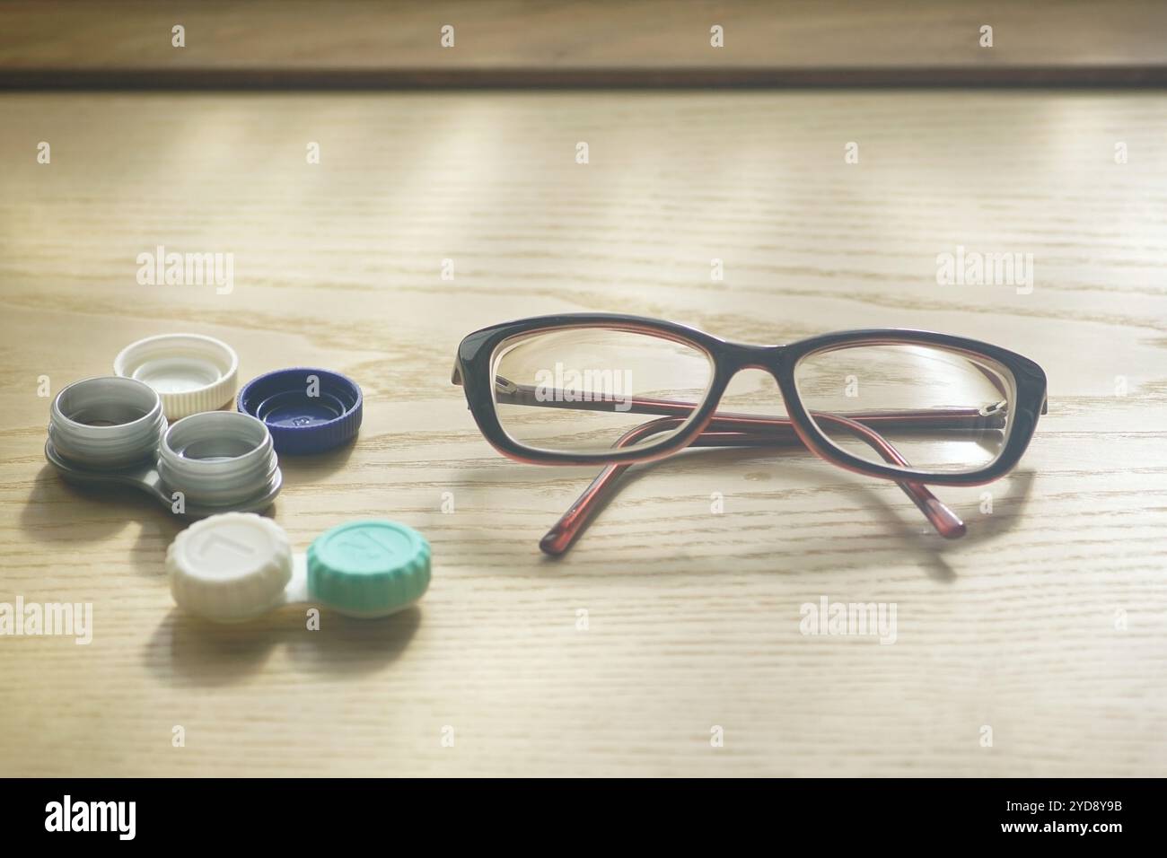 Options for correcting poor vision: glasses with a rectangular black ...