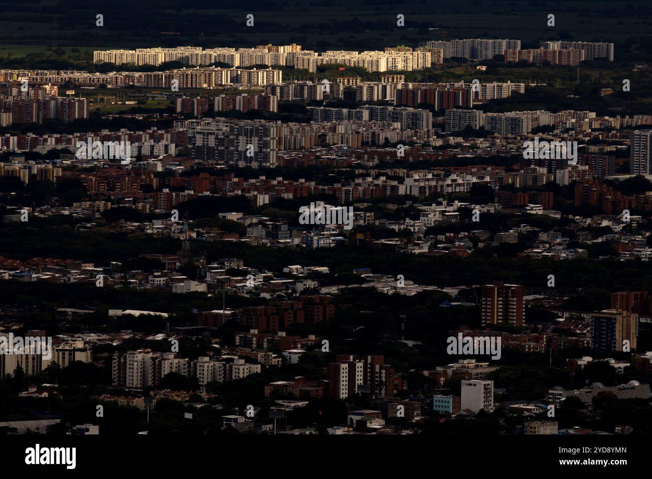 Buildings stretch across the Cauca Valley in the outskits of Cali ...