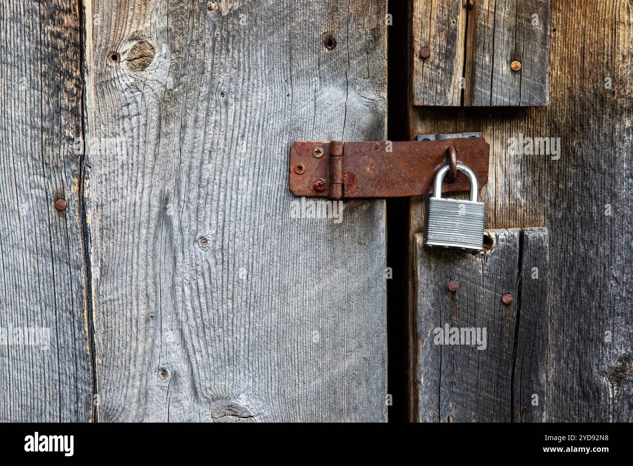 Rustic Wooden Door With Rusty Padlock for Security Concept Stock Photo ...